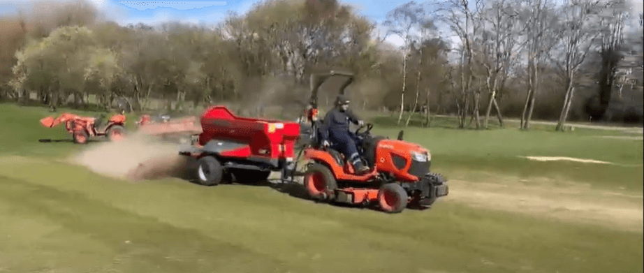 Great to see the hollow coring and top dressing underway at Springhead ...